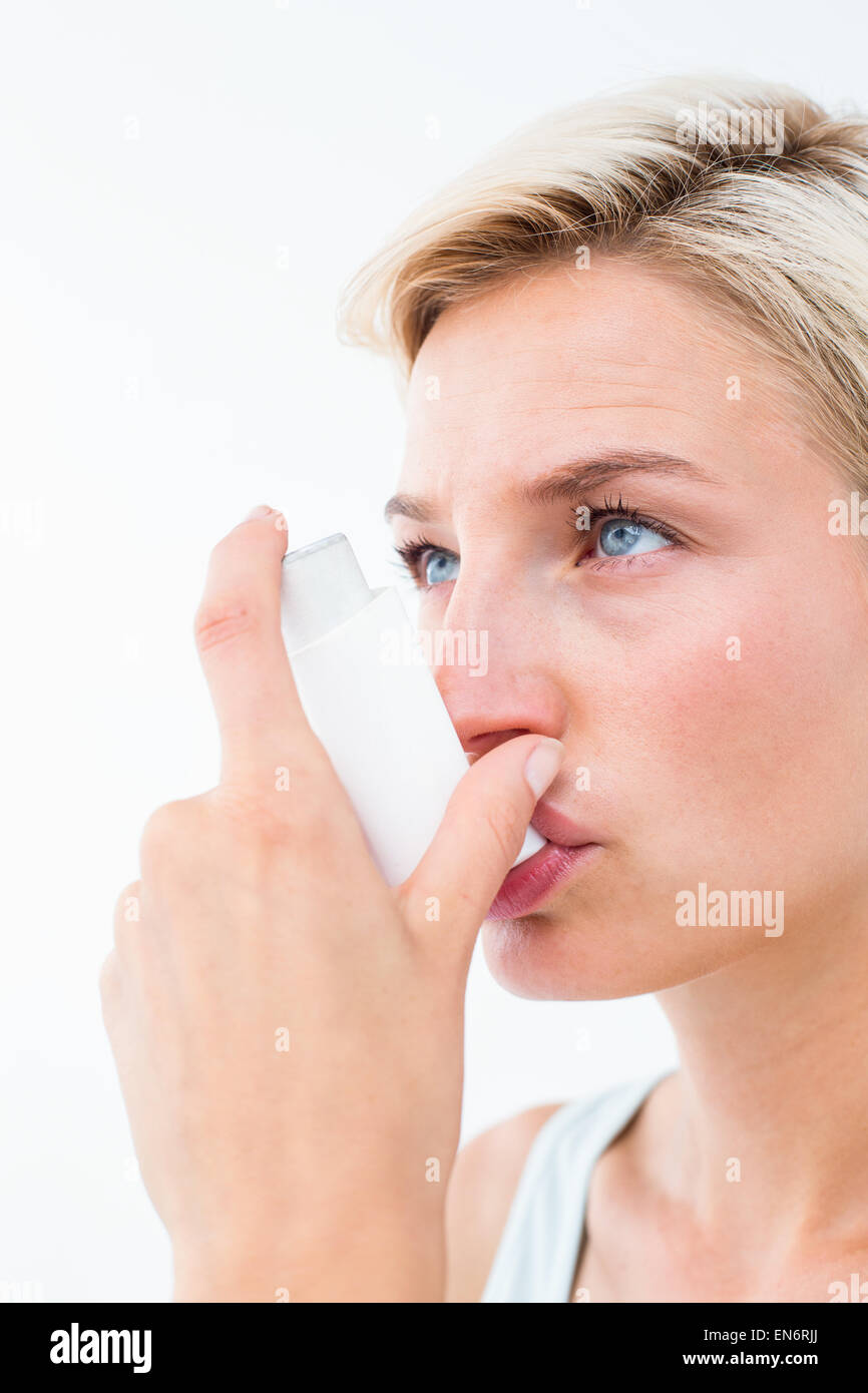 Woman asthma inhaler blue hi-res stock photography and images - Alamy
