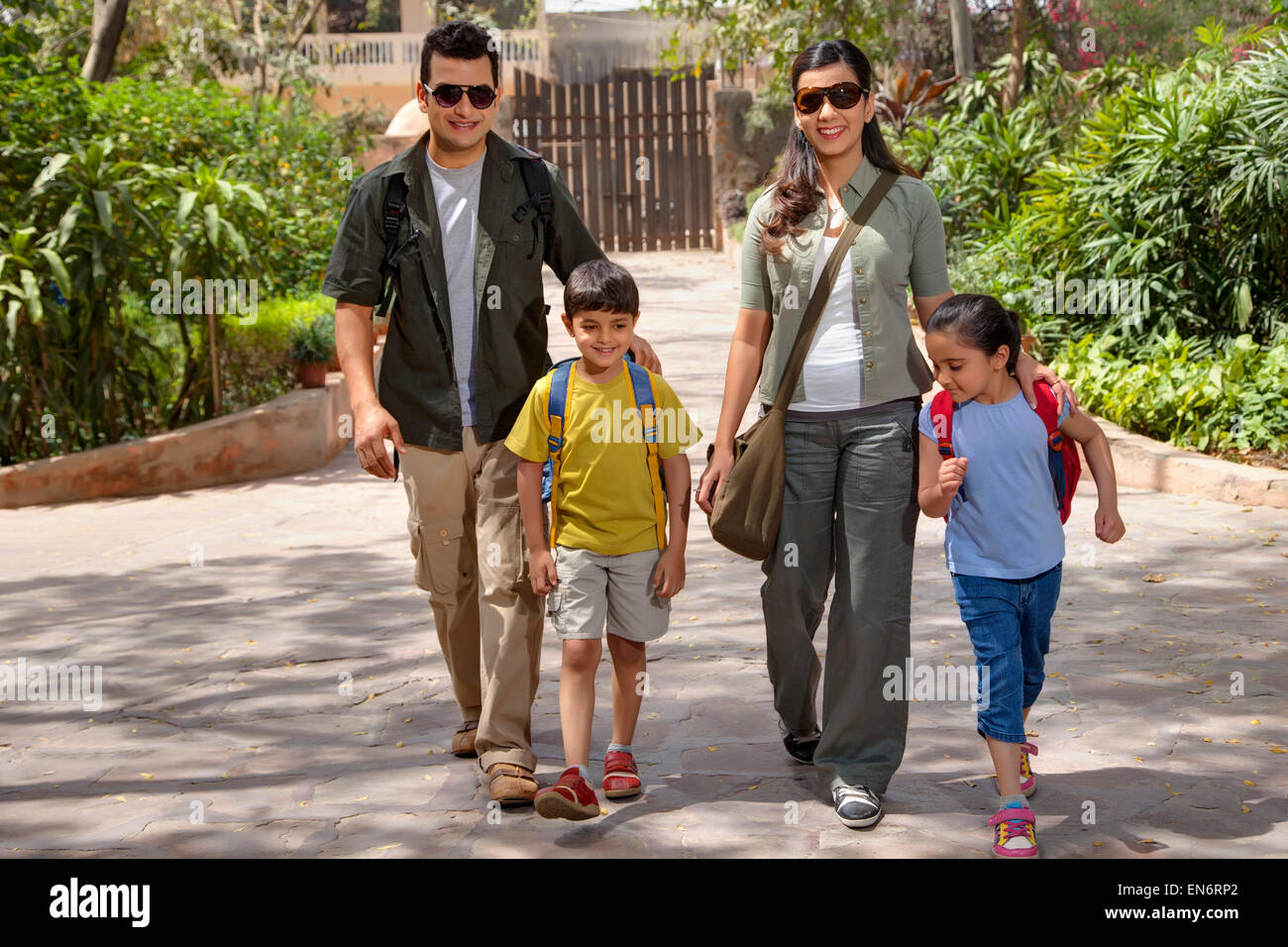 Family going for a walk Stock Photo - Alamy