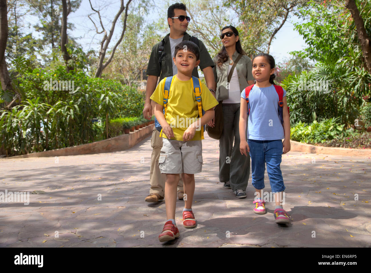 Family going for a walk Stock Photo - Alamy