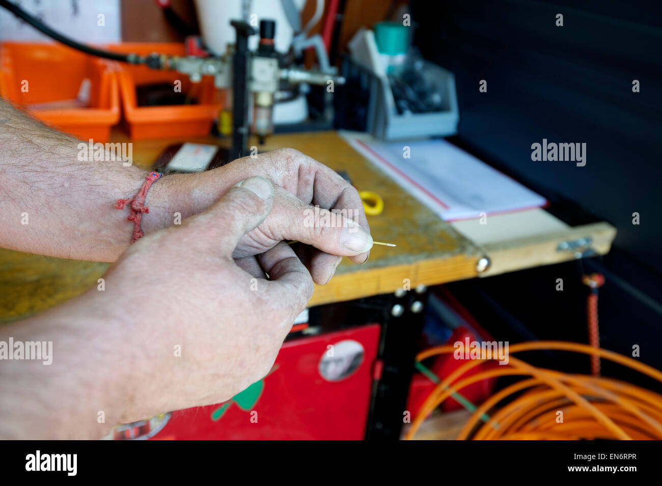 Men laying optical fiber cables Stock Photo - Alamy