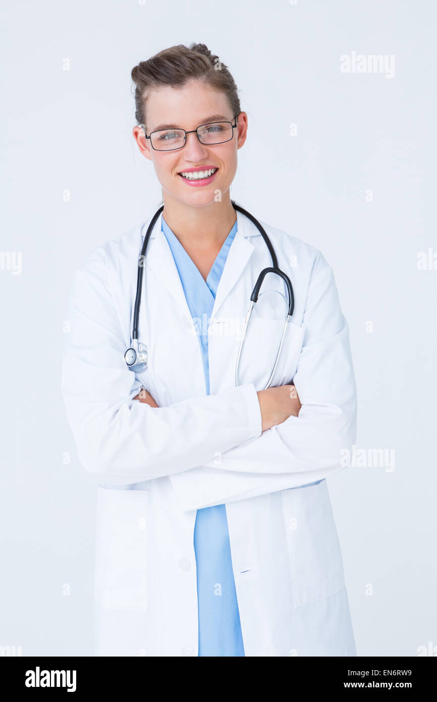 Caucasian doctor smiling camera arms hi-res stock photography and images - Alamy