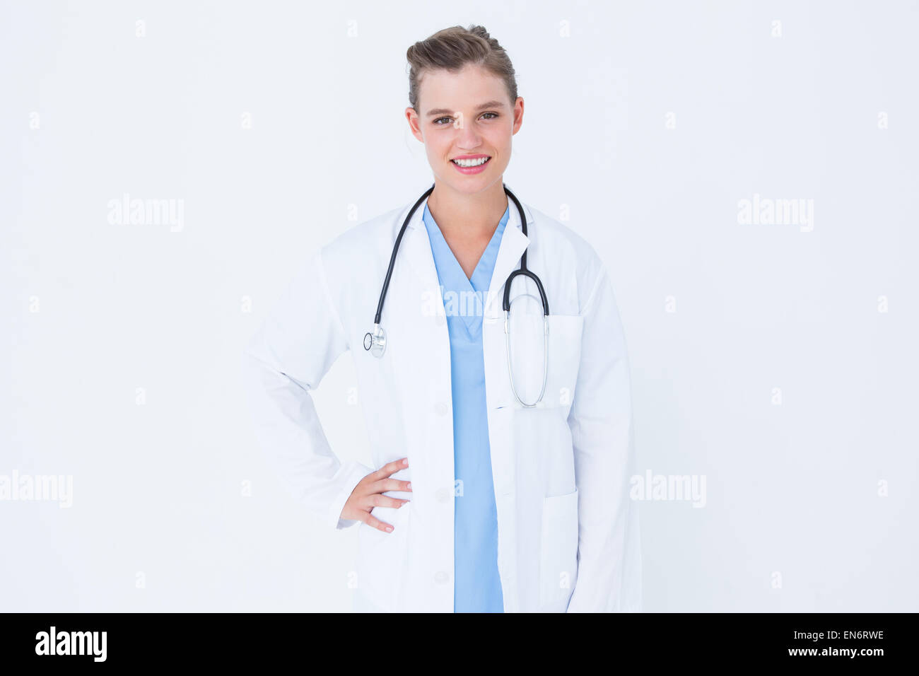 Happy doctor smiling at camera Stock Photo - Alamy