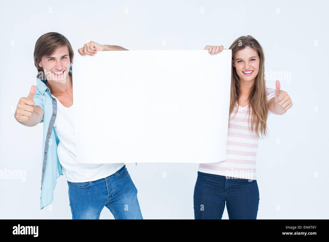 Hands holding poster hi-res stock photography and images - Alamy