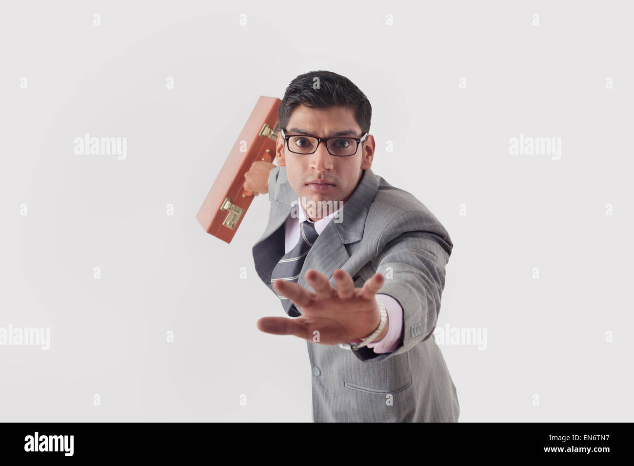 Portrait of businessman getting late Stock Photo - Alamy