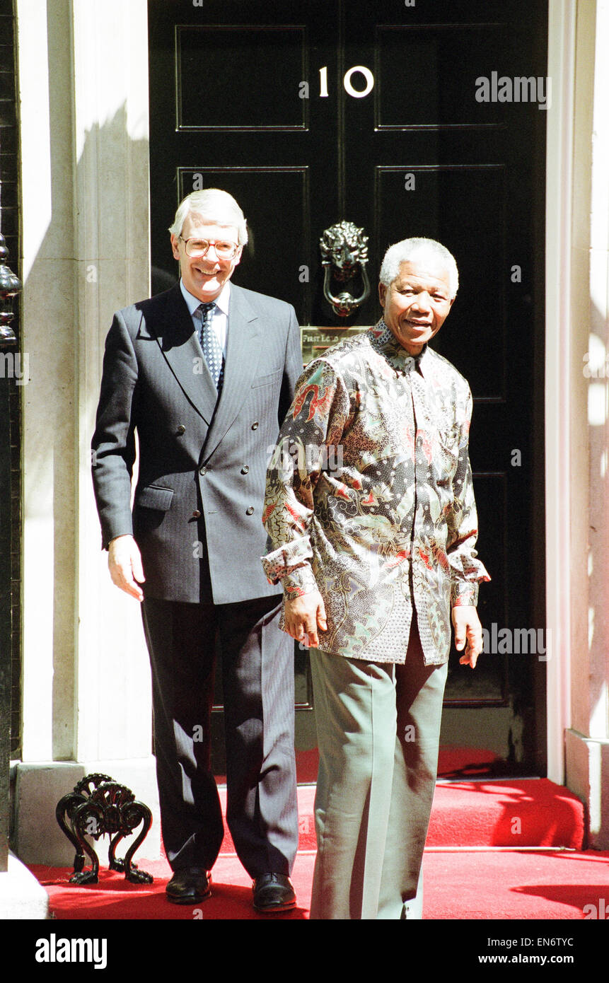 South African President Nelson Mandela is welcomed by British Prime ...