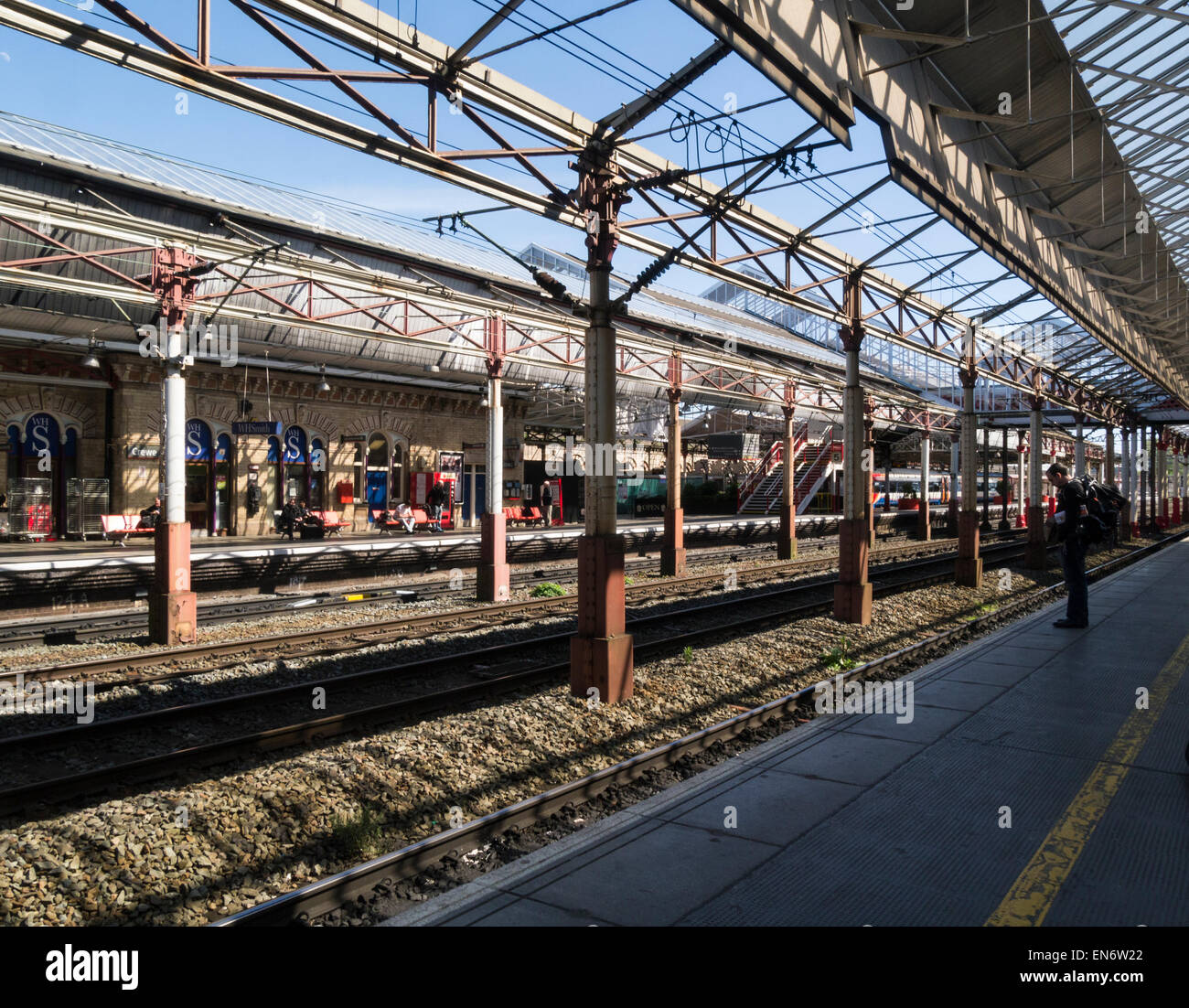 Passengers waiting on Crewe Cheshire England UK railway station ...