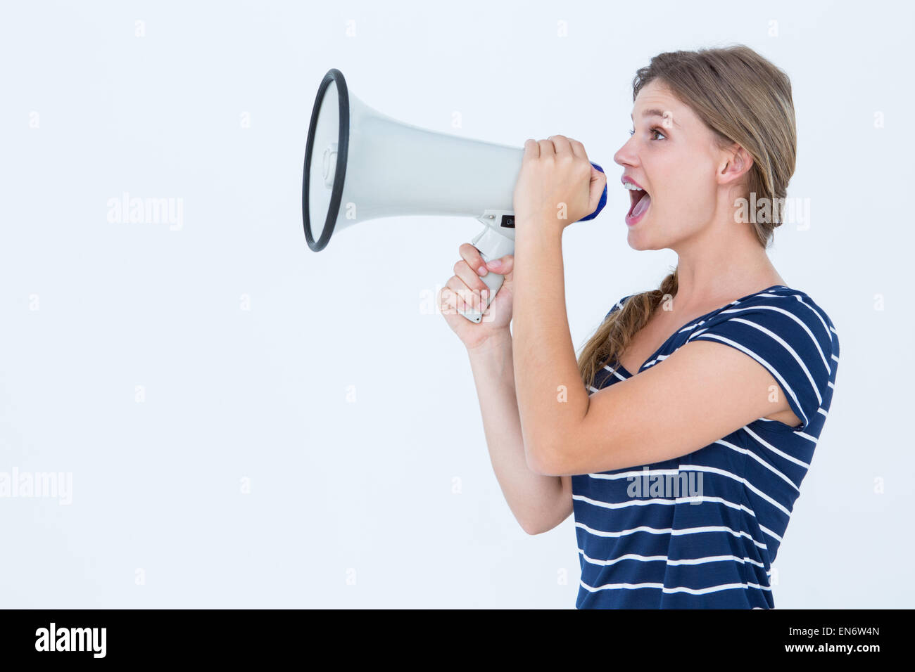 Woman speaking through a loudspeaker Stock Photo - Alamy