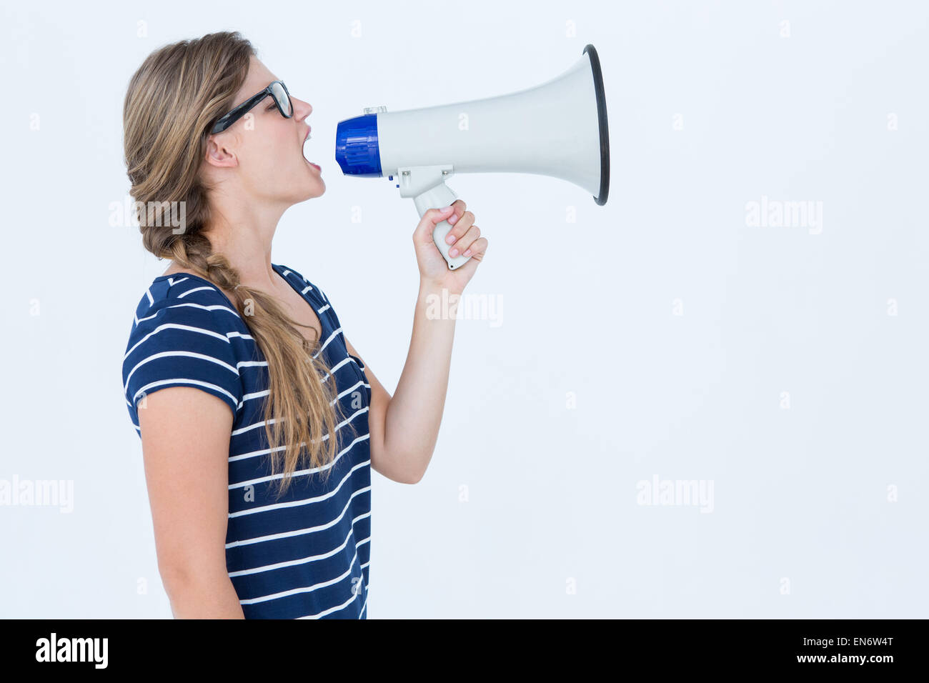 Woman shouting through a loudspeaker Stock Photo - Alamy