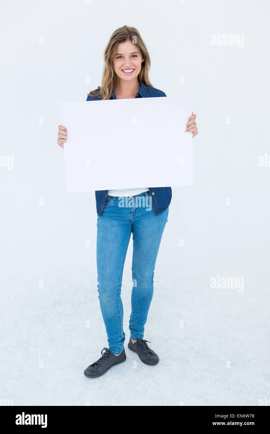 Woman holding poster Stock Photo - Alamy