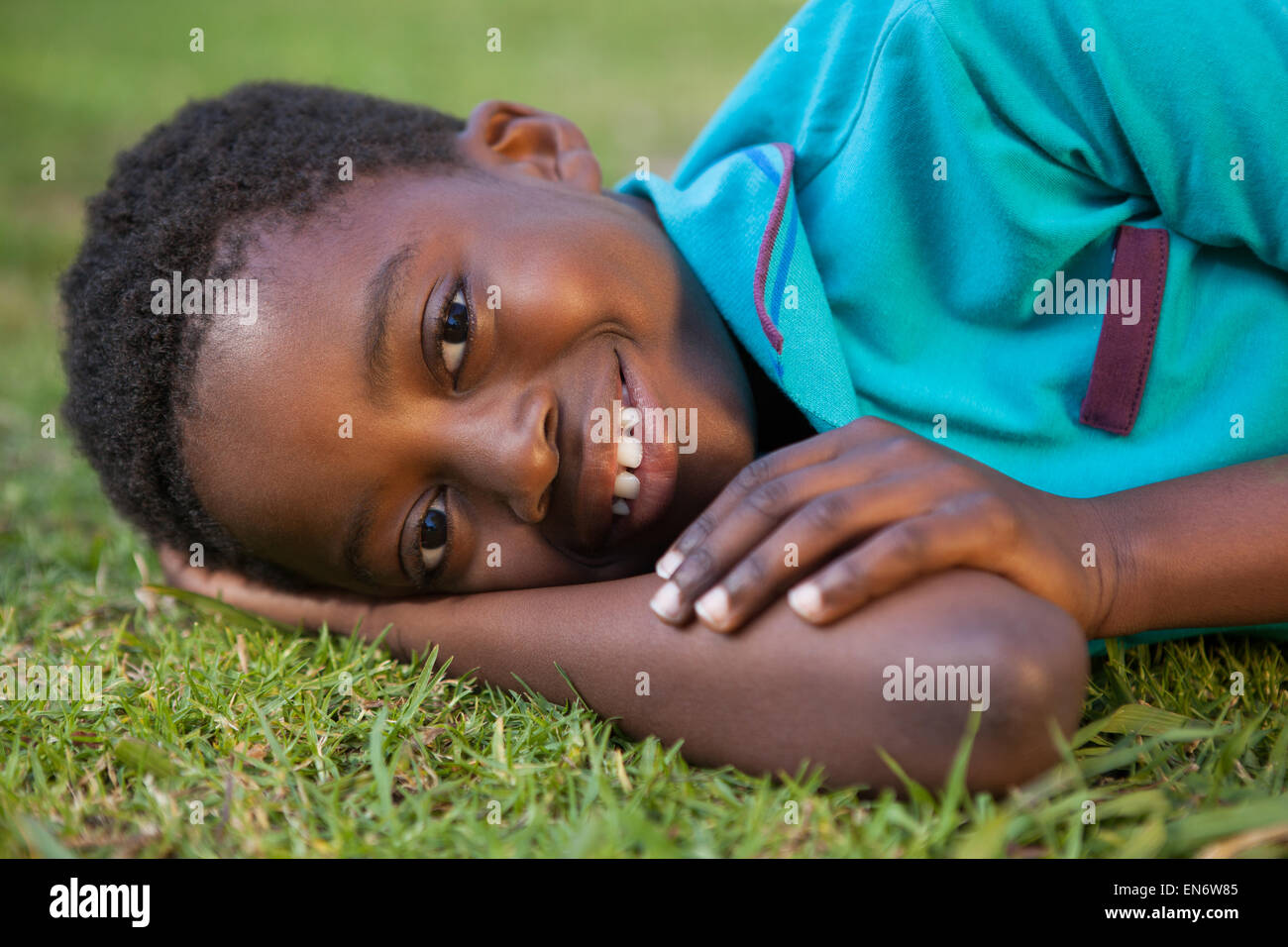 Little boy smiling at camera Stock Photo - Alamy