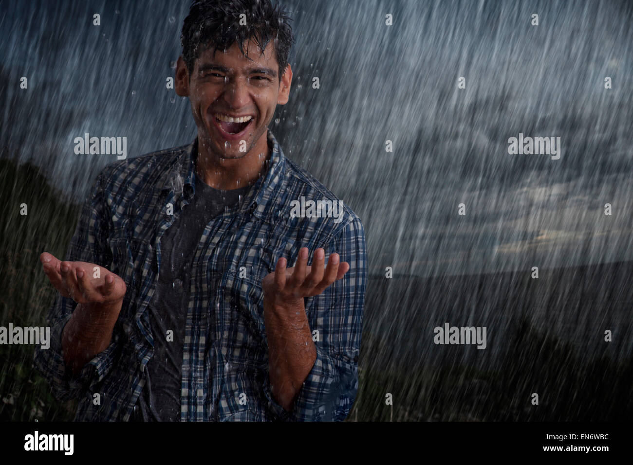 Man enjoying in the rain Stock Photo - Alamy