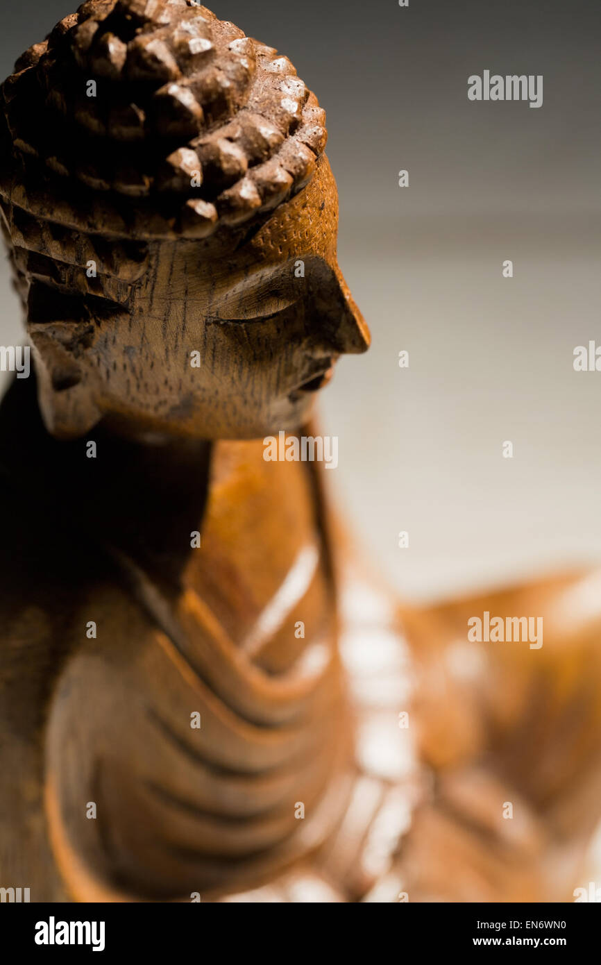 Buddha statue on a table Stock Photo - Alamy