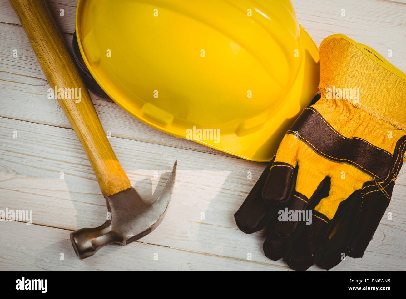 Hard hat and protective gloves Stock Photo - Alamy