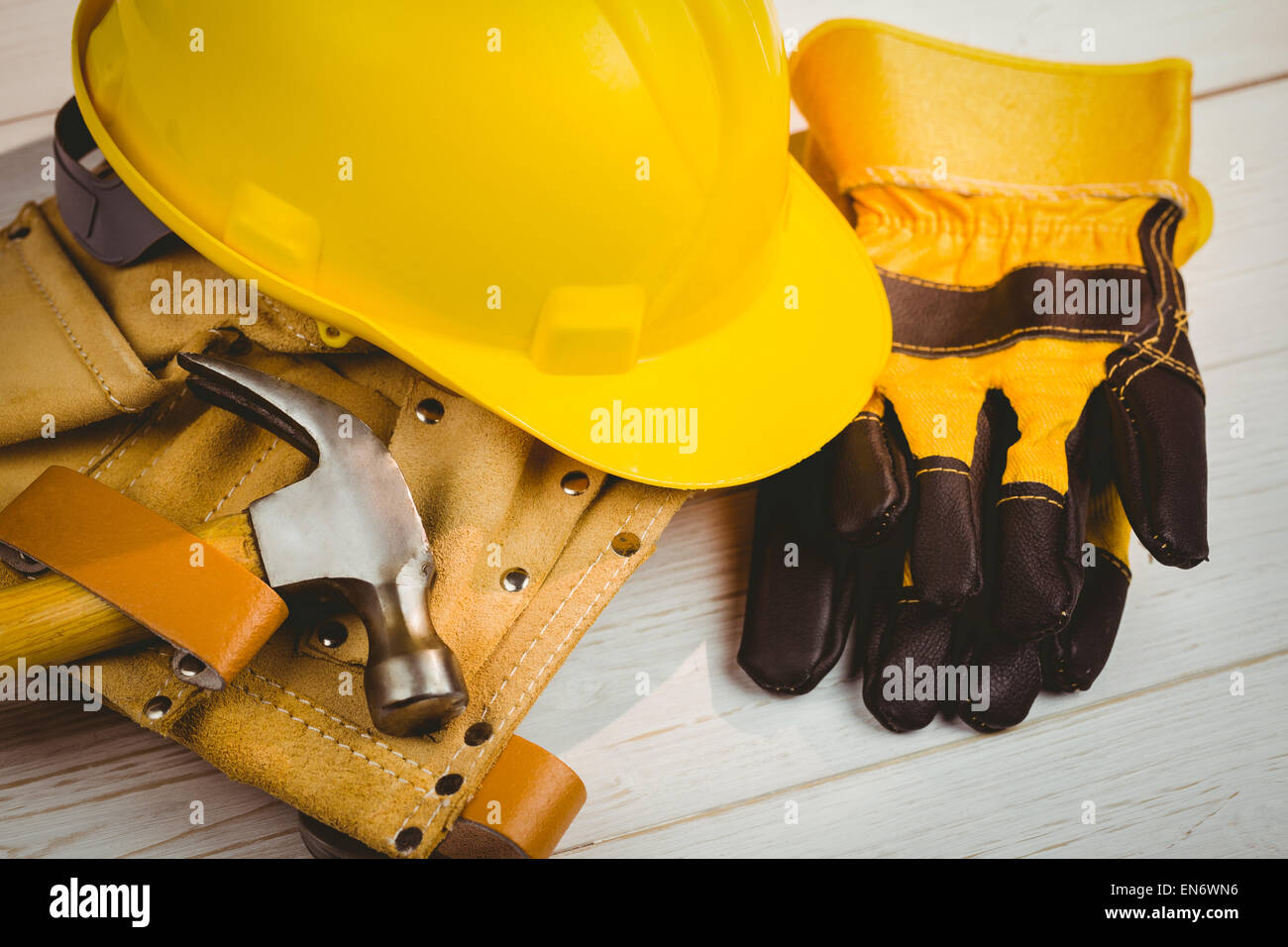 Hard hat and protective gloves Stock Photo - Alamy