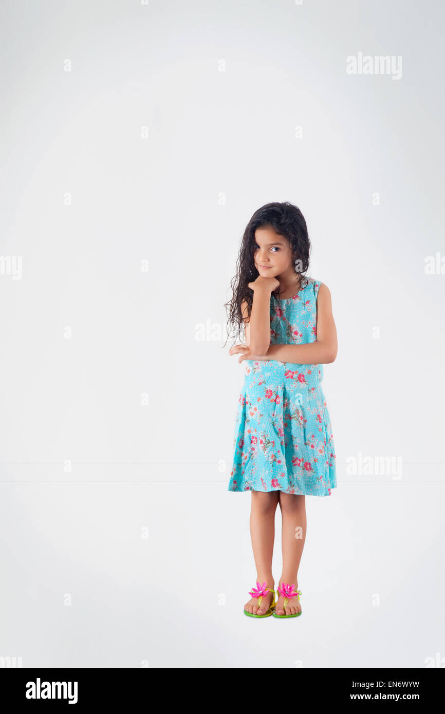 Portrait of little girl standing Stock Photo - Alamy
