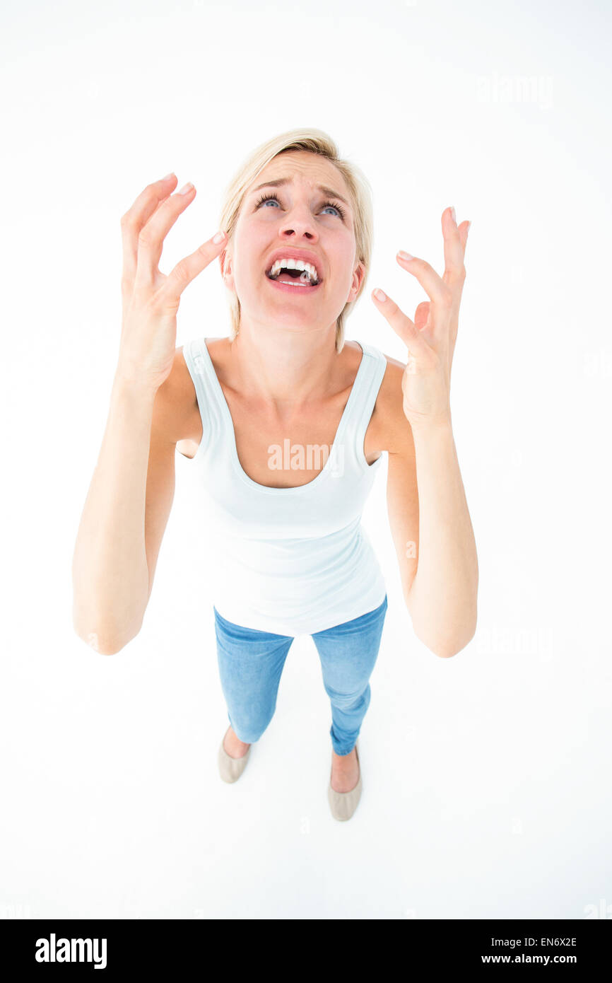 Upset woman yelling with hands up Stock Photo - Alamy
