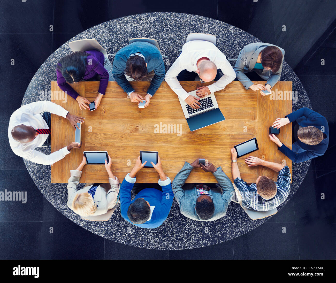 Group of Business People Using Digital Devices Stock Photo - Alamy