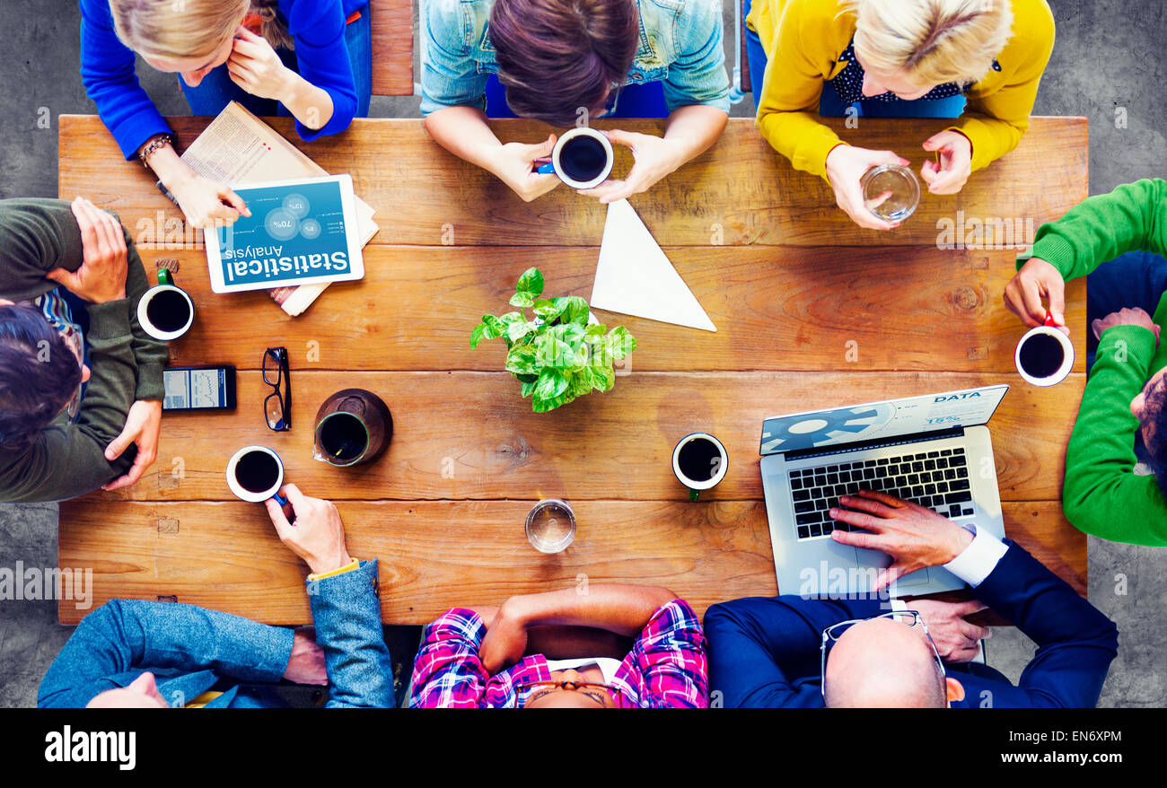 Diverse People Using Technologies and Talking Stock Photo - Alamy