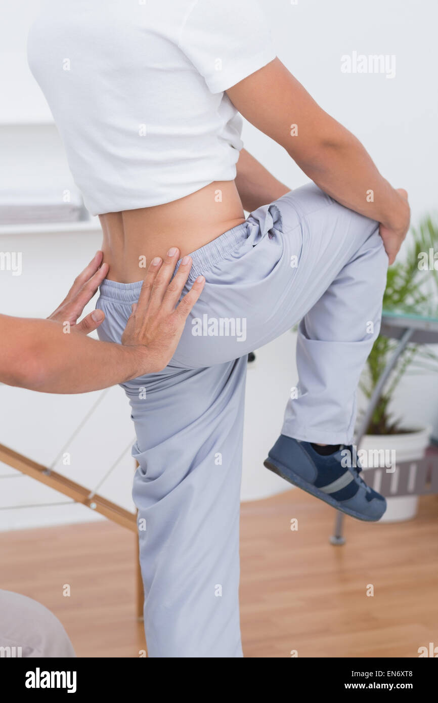 Doctor examining his patient back Stock Photo - Alamy