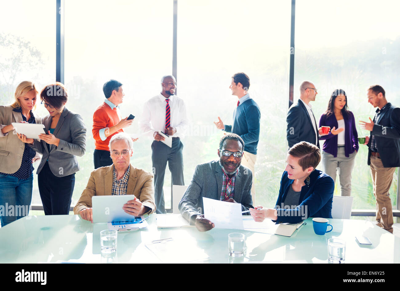 Group of Business People Discussing in the Office Stock Photo - Alamy