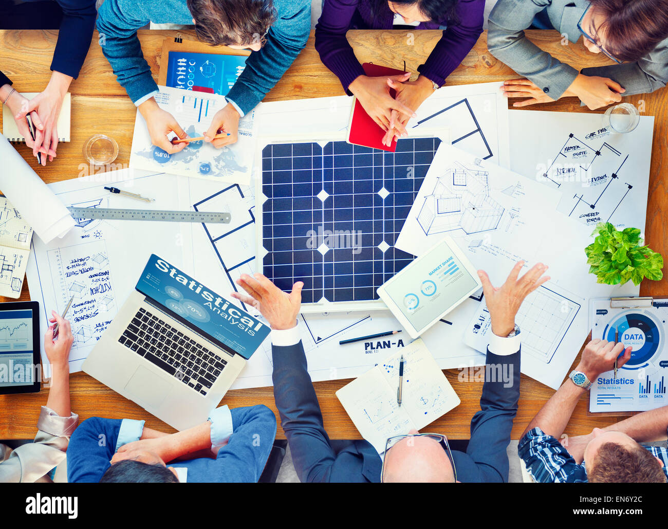 The Architects Brainstorming with Blueprint Stock Photo - Alamy