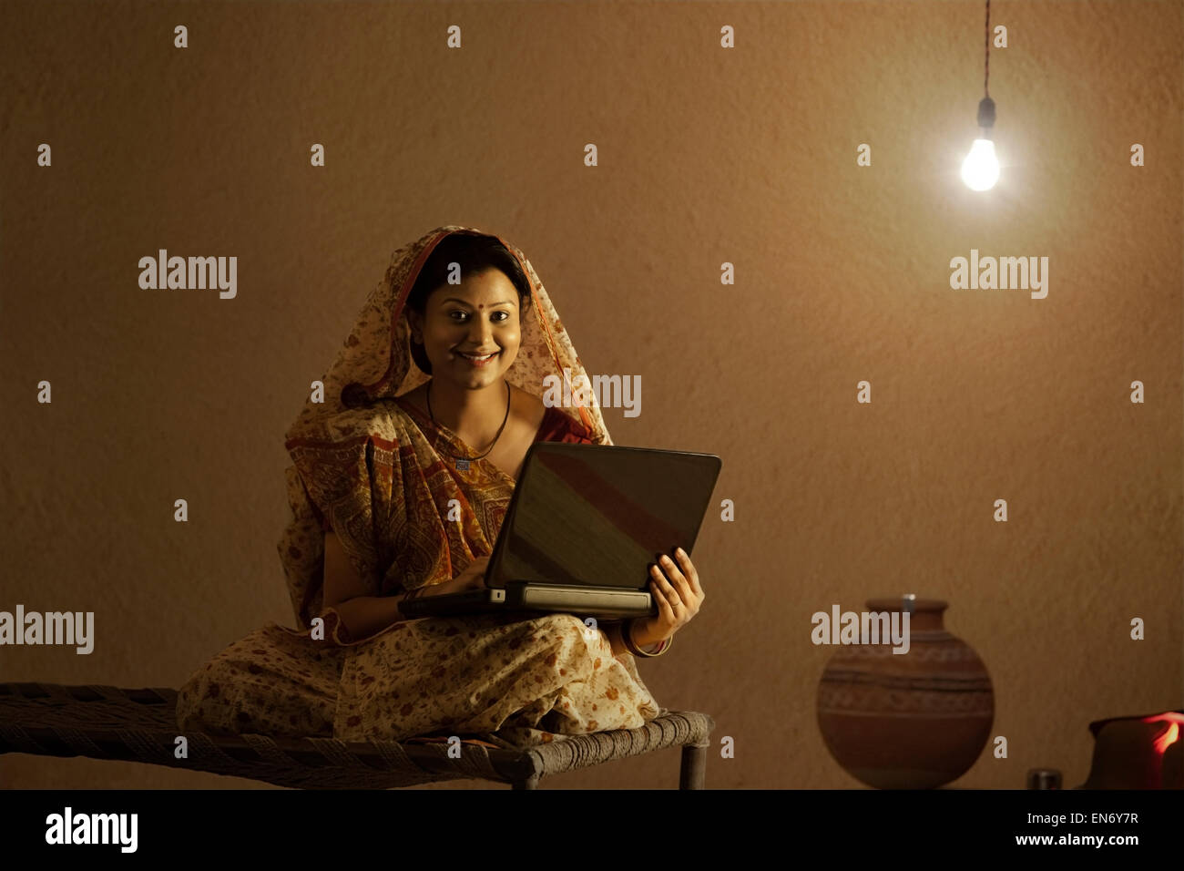 Portrait of rural woman with laptop Stock Photo - Alamy