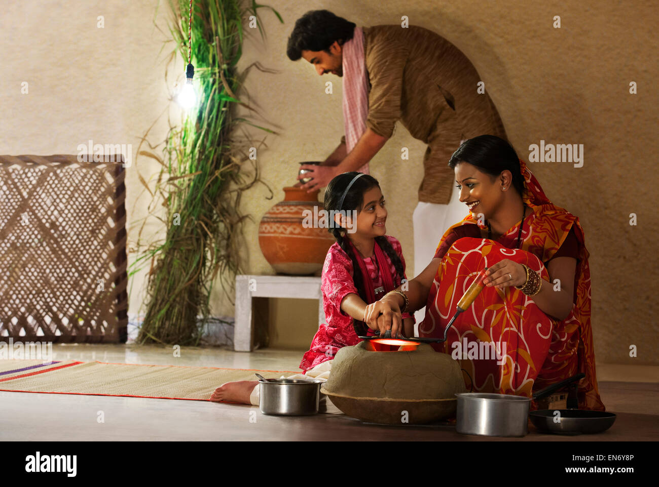 Teaching young cook hi-res stock photography and images - Alamy