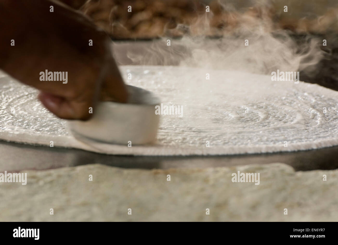 Indian man making dosa hi-res stock photography and images - Alamy