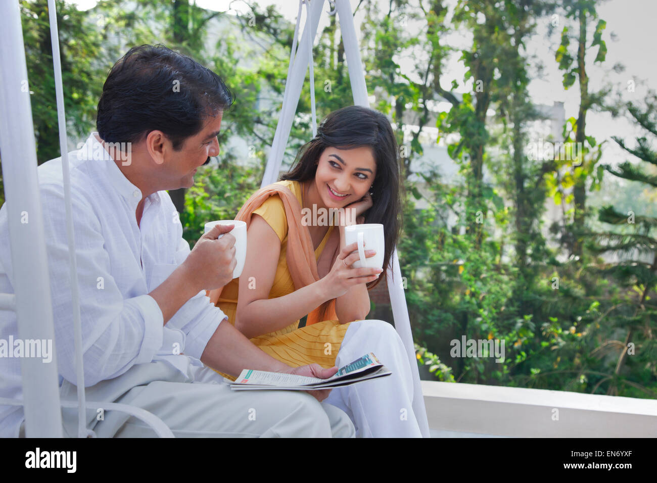 Couple having tea together Stock Photo - Alamy