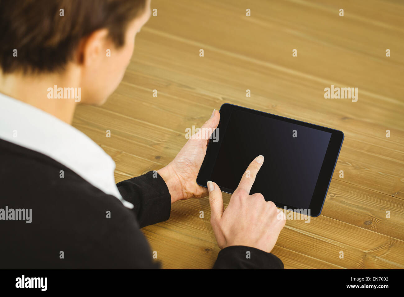 Hand businesswoman using tablet hi-res stock photography and images - Alamy