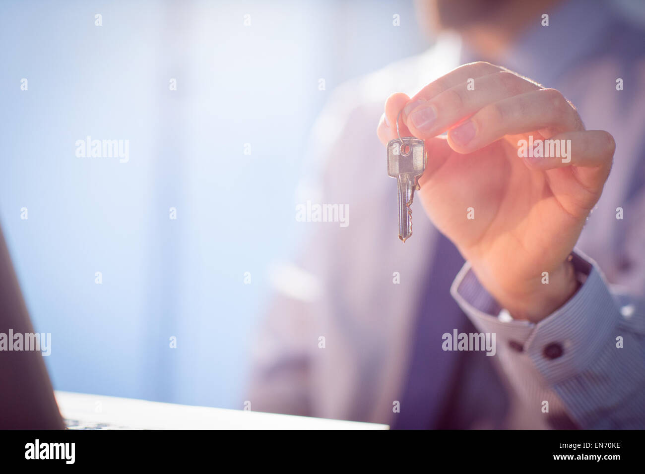 Businessman holding key hi-res stock photography and images - Alamy