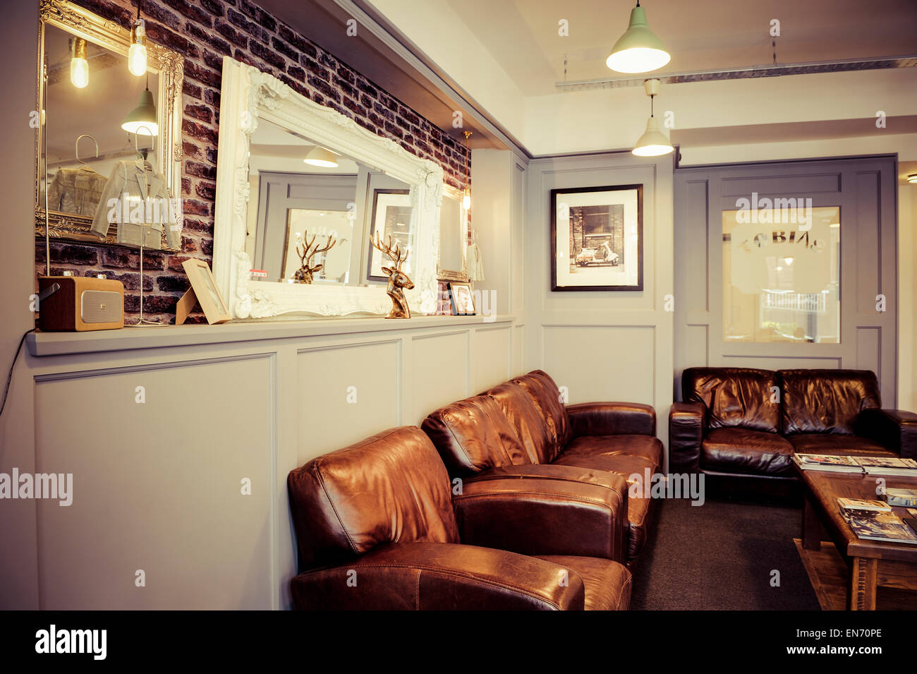 Men's barber shop, retro styled interior design Stock Photo - Alamy