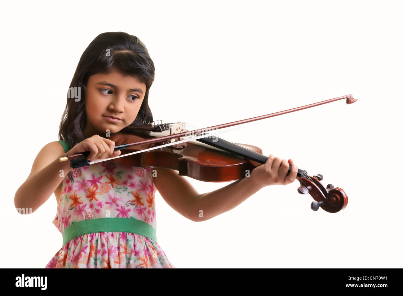 Indian girl playing violin Cut Out Stock Images & Pictures - Alamy