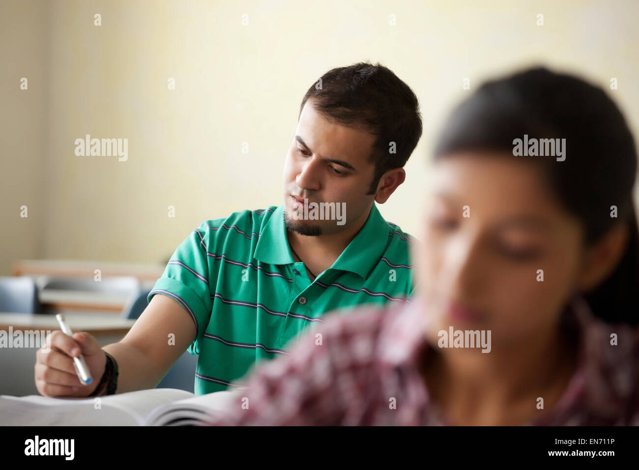 Side profile of graduate students Stock Photo - Alamy