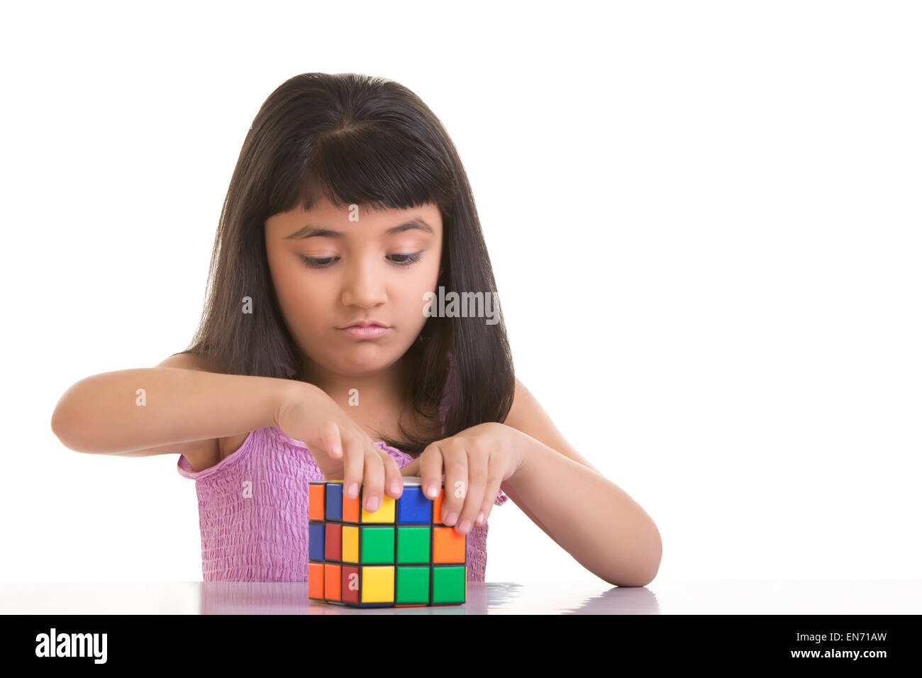 Girl with rubiks cube hi-res stock photography and images - Alamy
