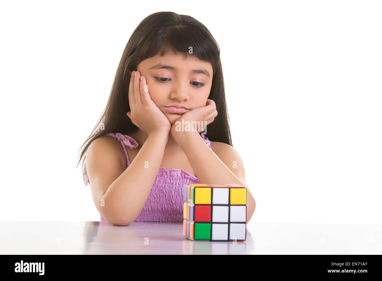 Girl with rubiks cube hi-res stock photography and images - Alamy