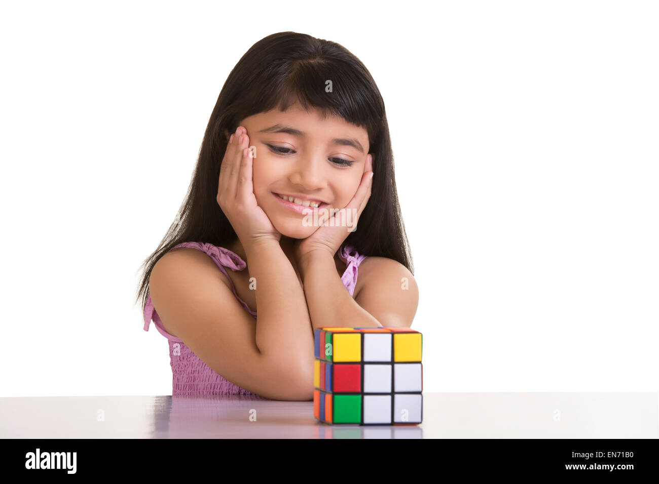 Girl With Rubiks Cube High Resolution Stock Photography and Images - Alamy