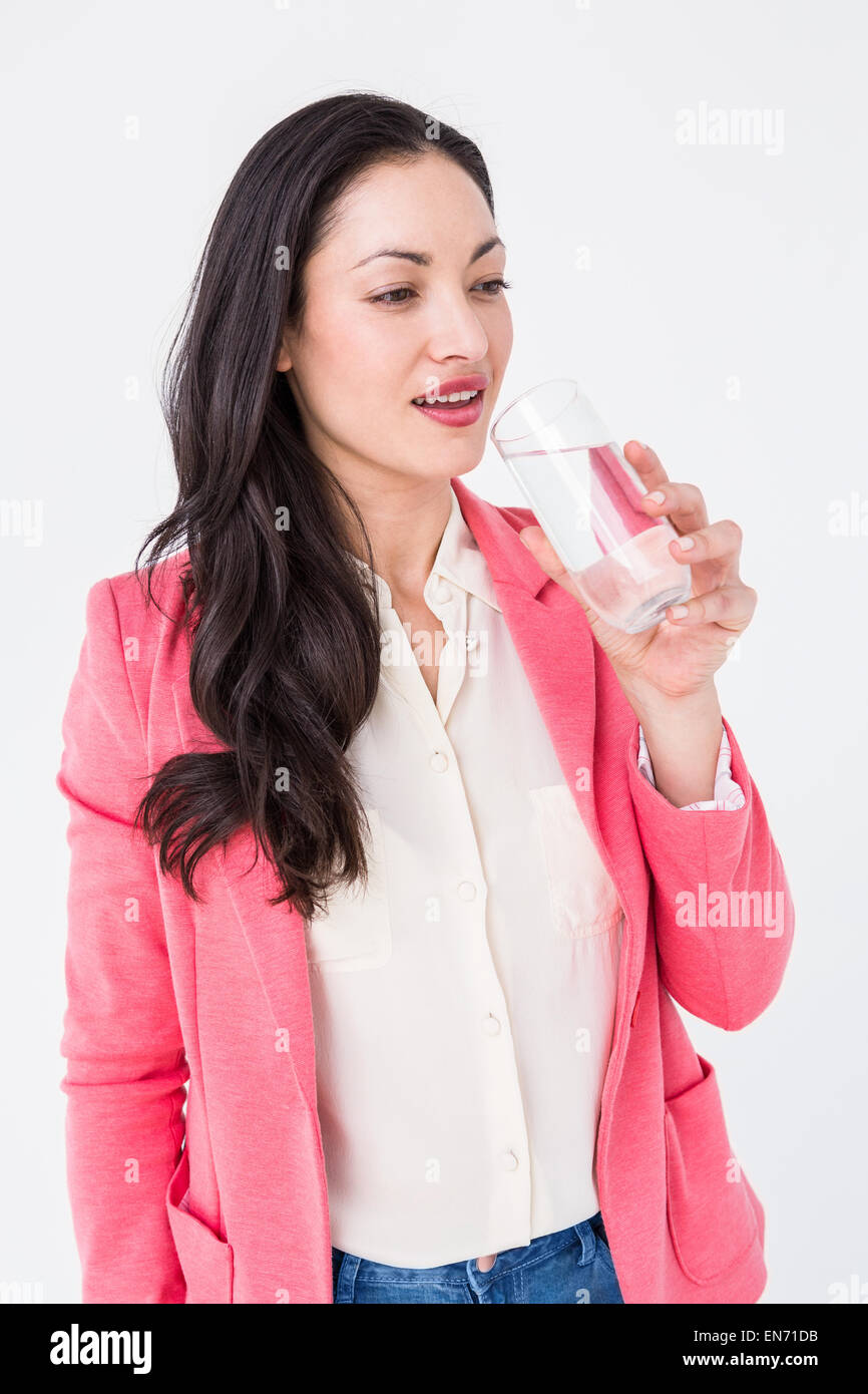 Pretty brunette drinking water Stock Photo - Alamy