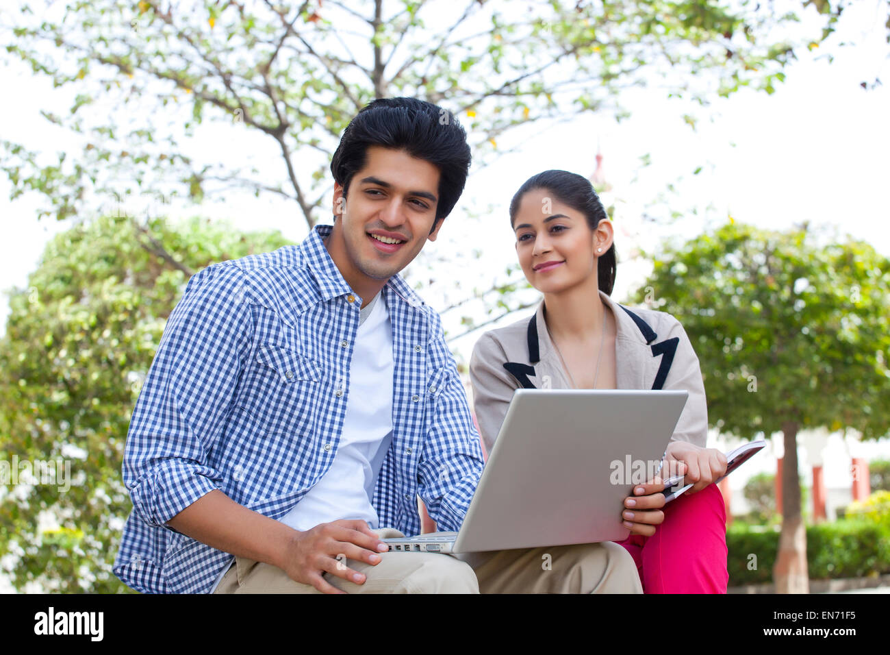 College students talking in classroom Stock Photo - Alamy