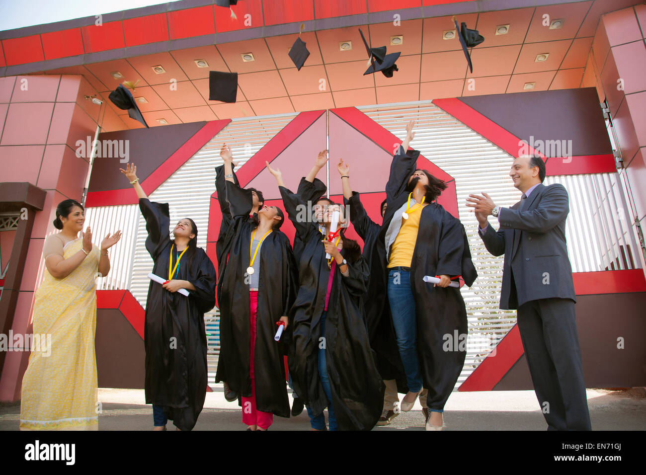 College students fooling around in classroom Stock Photo - Alamy