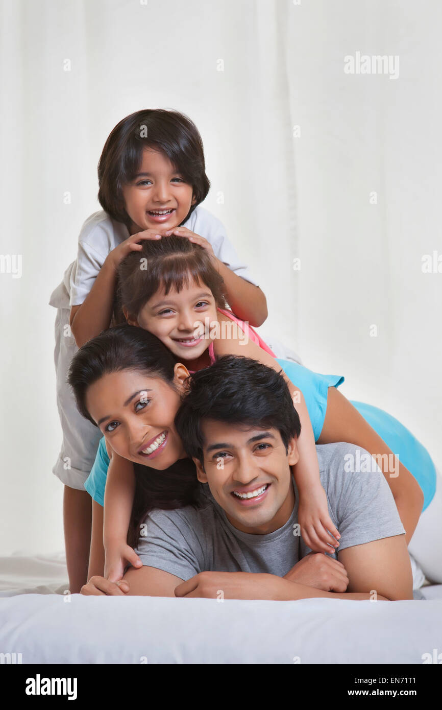 Portrait of family smiling Stock Photo - Alamy