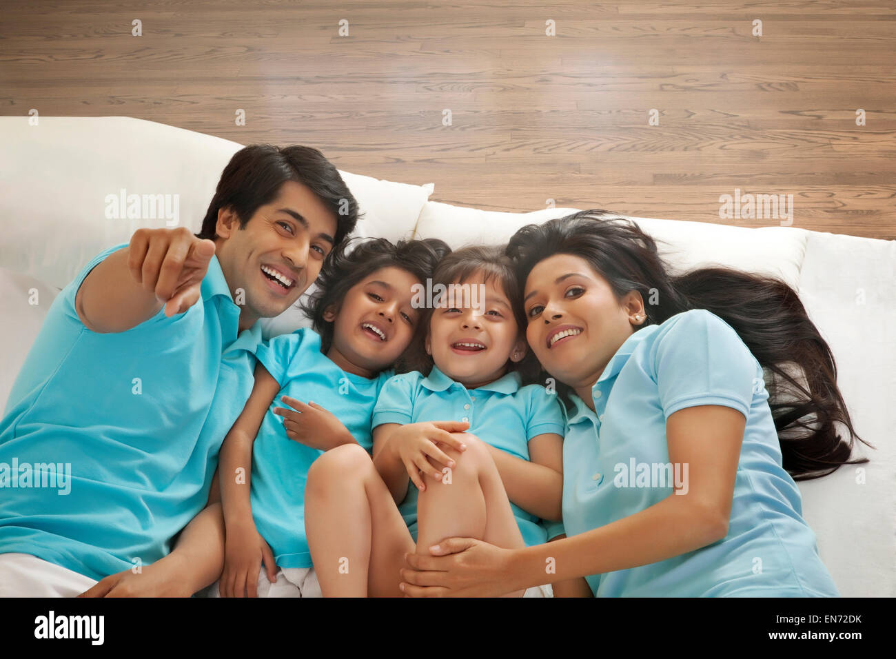Portrait of family smiling Stock Photo - Alamy