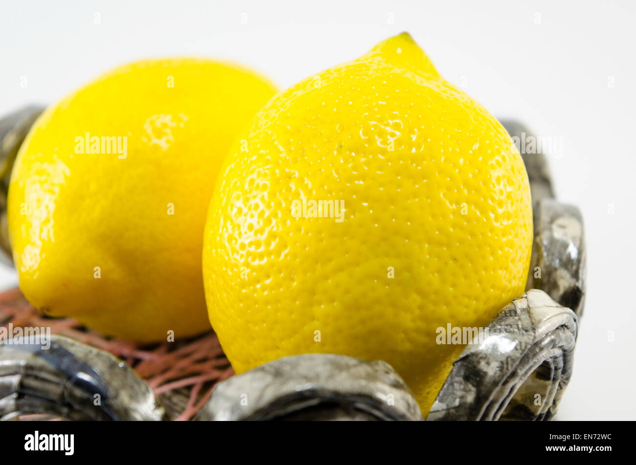 Lemons in white bowl hi-res stock photography and images - Alamy