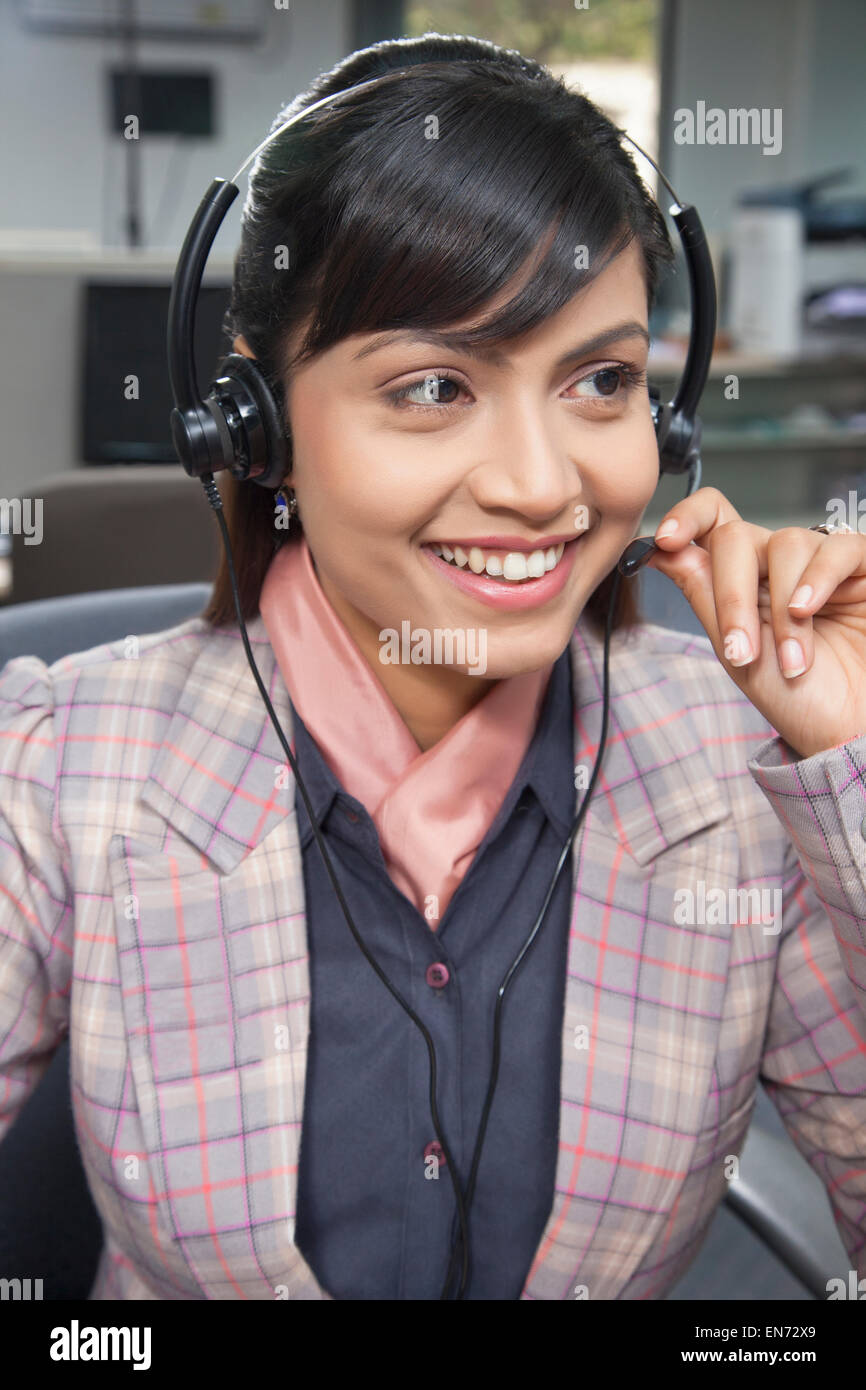 Female executive working in office Stock Photo - Alamy