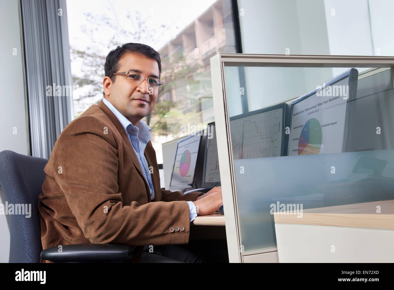 Indian male office worker hi-res stock photography and images - Alamy