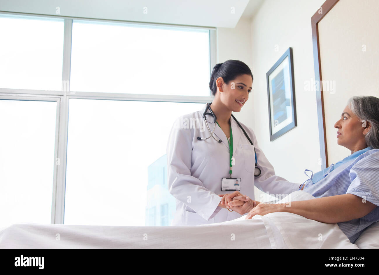 Holding the patients hand hi-res stock photography and images - Alamy