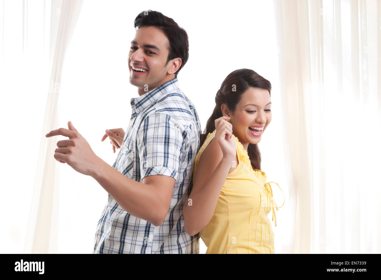 Young couple having fun Stock Photo - Alamy