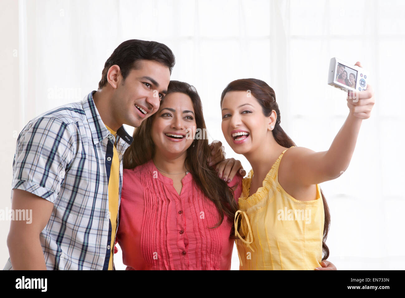 Family taking a self portrait Stock Photo - Alamy