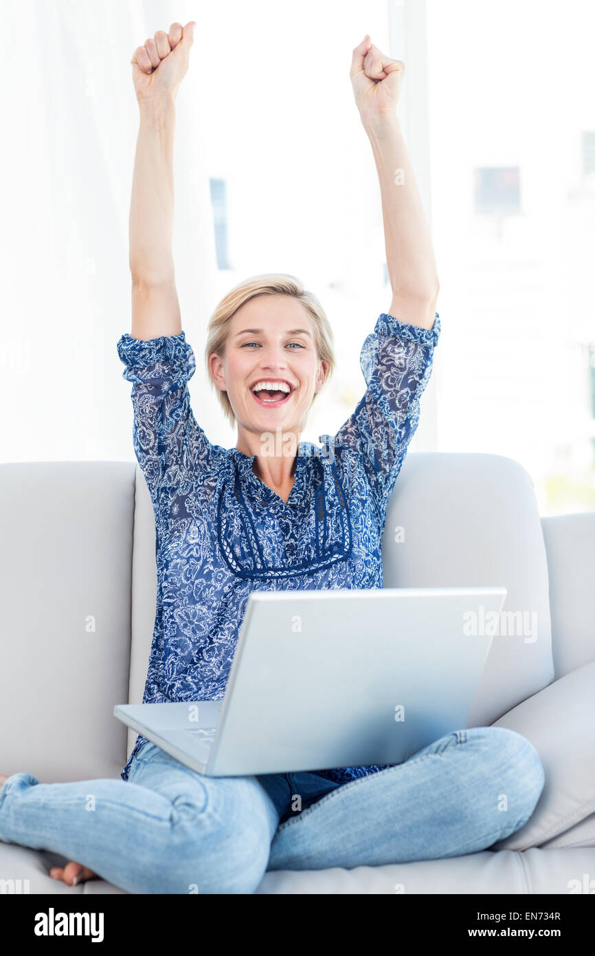 Beautiful blonde woman cheering hi-res stock photography and images - Alamy