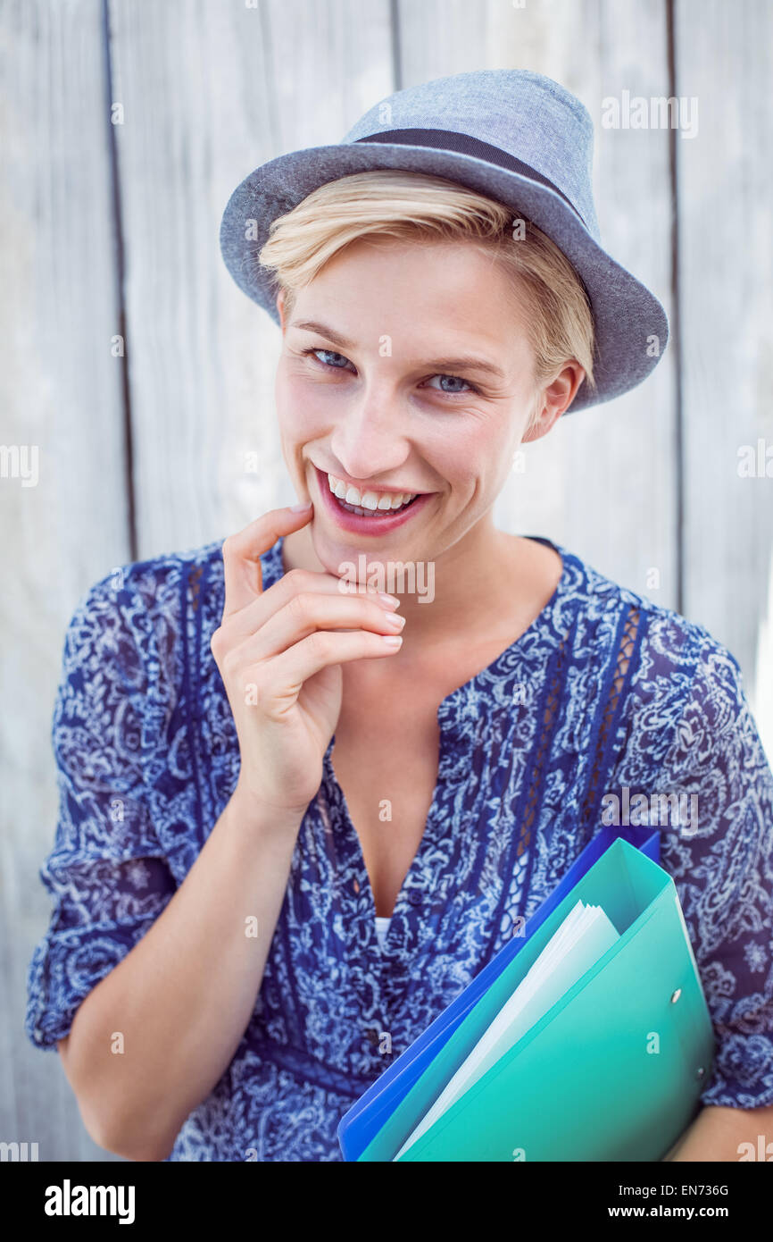 Pretty blonde woman holding folders Stock Photo - Alamy Pretty blonde woman holding folders Stock Photo - Alamy